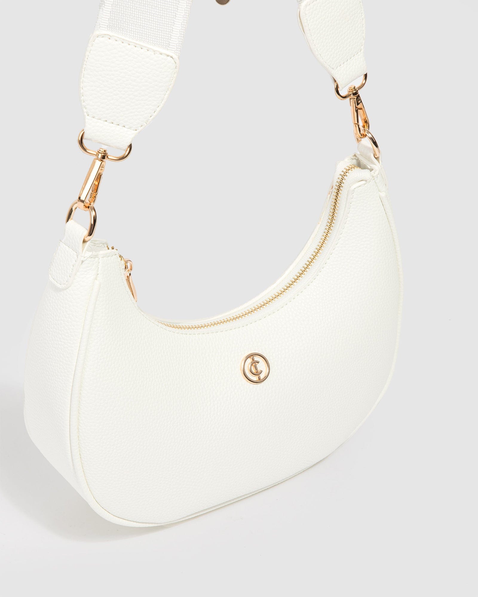 White Flavia Webbing Crossbody Bag with Gold tone Hardware | Colette Hayman
